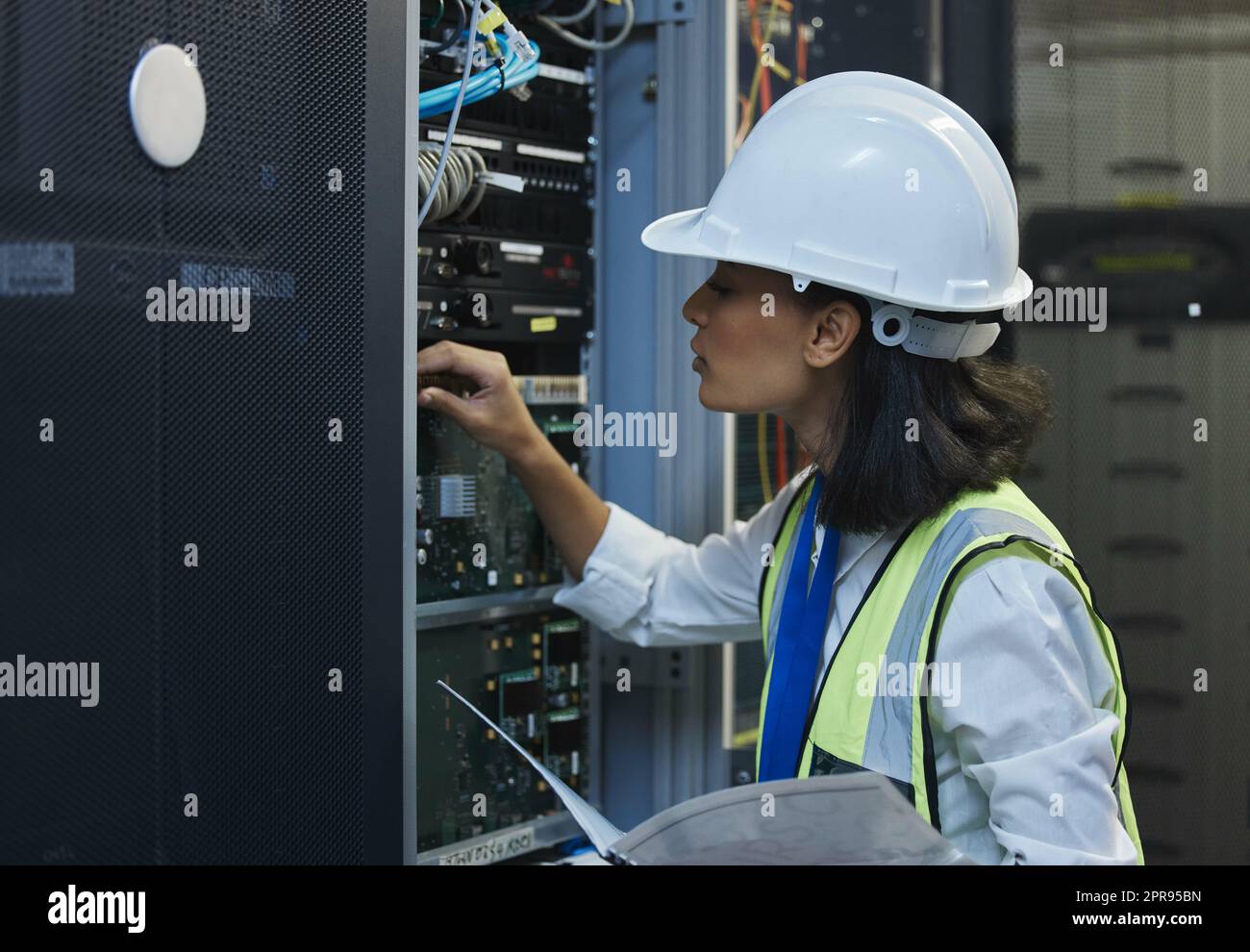 Leave it to women if you want it well done. a young woman working on ...