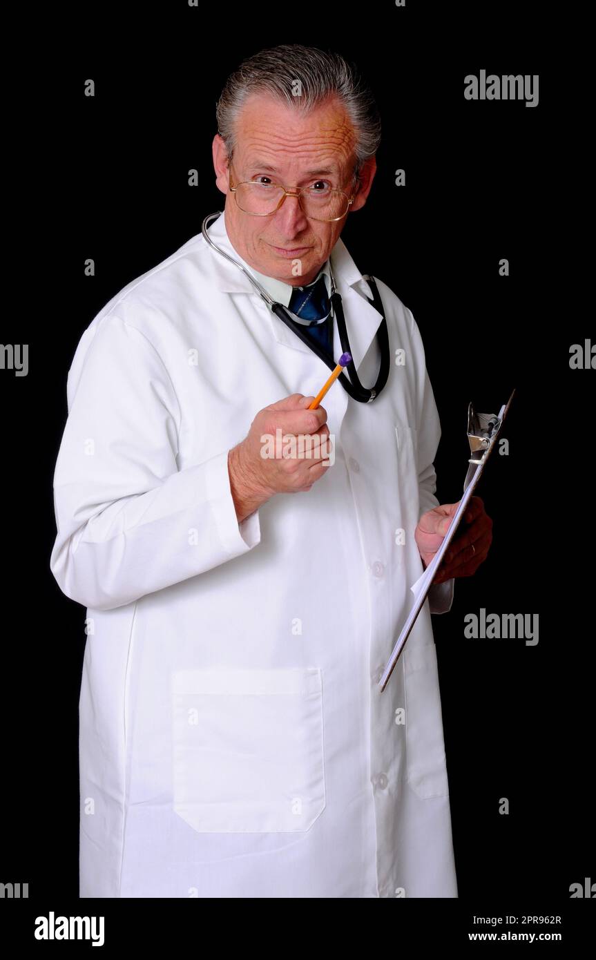 Senior doctor wearing a stethoscope isolated on black Stock Photo - Alamy