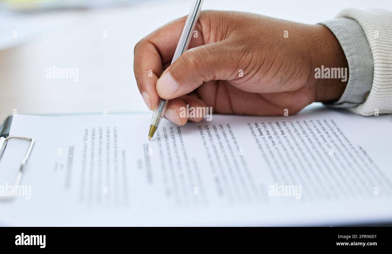 Going over every detail before signing the agreement. Closeup shot of ...