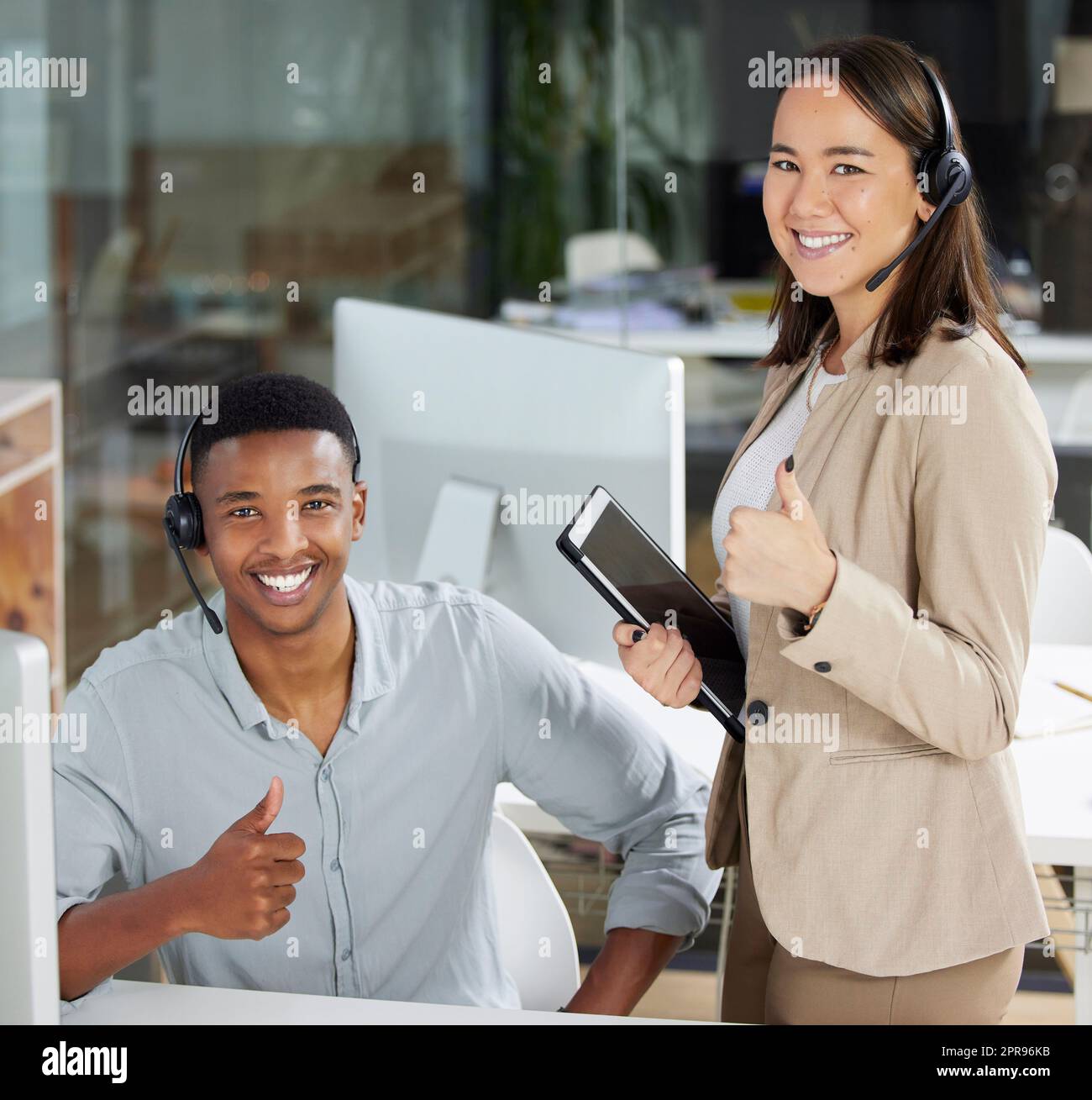 Our call success rate speaks for itself. a young man and woman showing ...