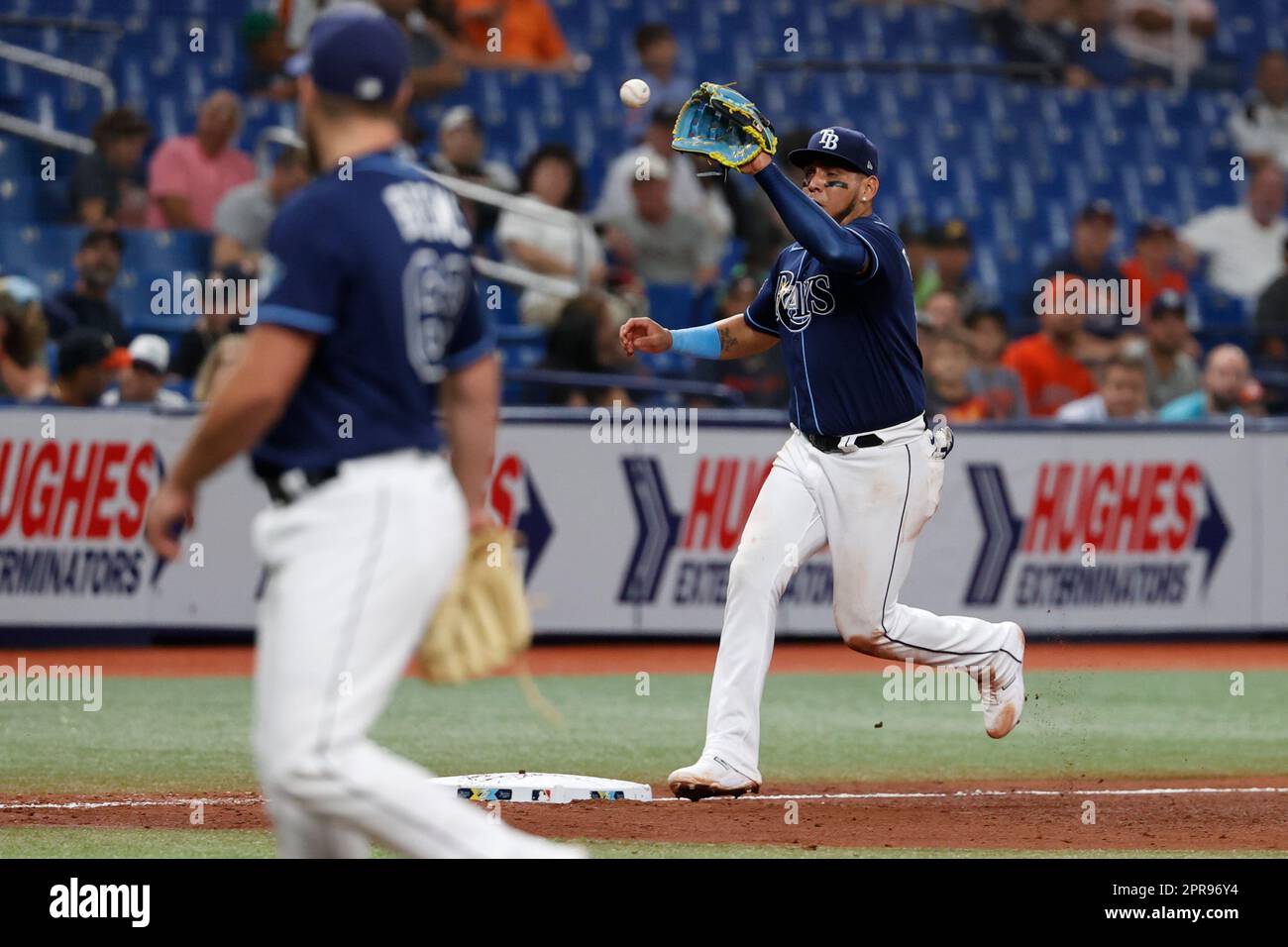 Tampa Bay Rays' Isaac Parades fields a ground ball during baseball game ...