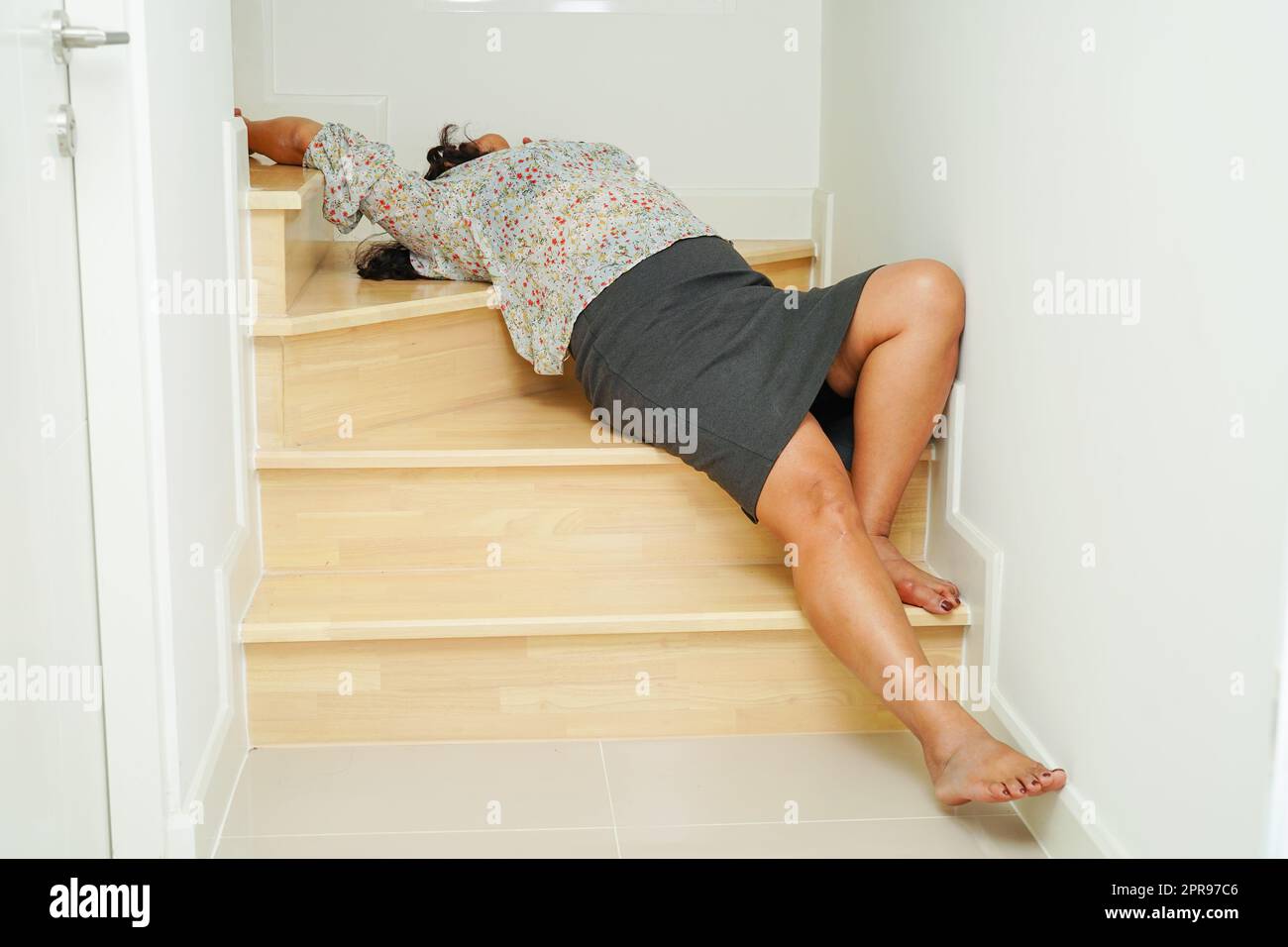 Asian lady woman injuries from falling down on slippery surfaces stairs ...