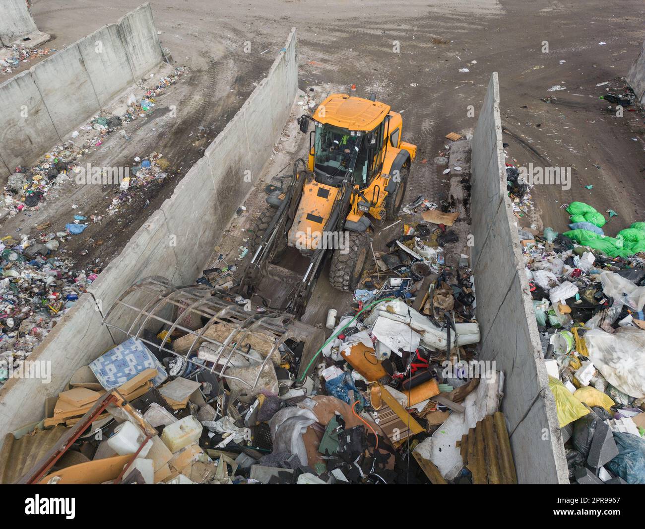Heavy construction machine, front end loader moving along recycling ...