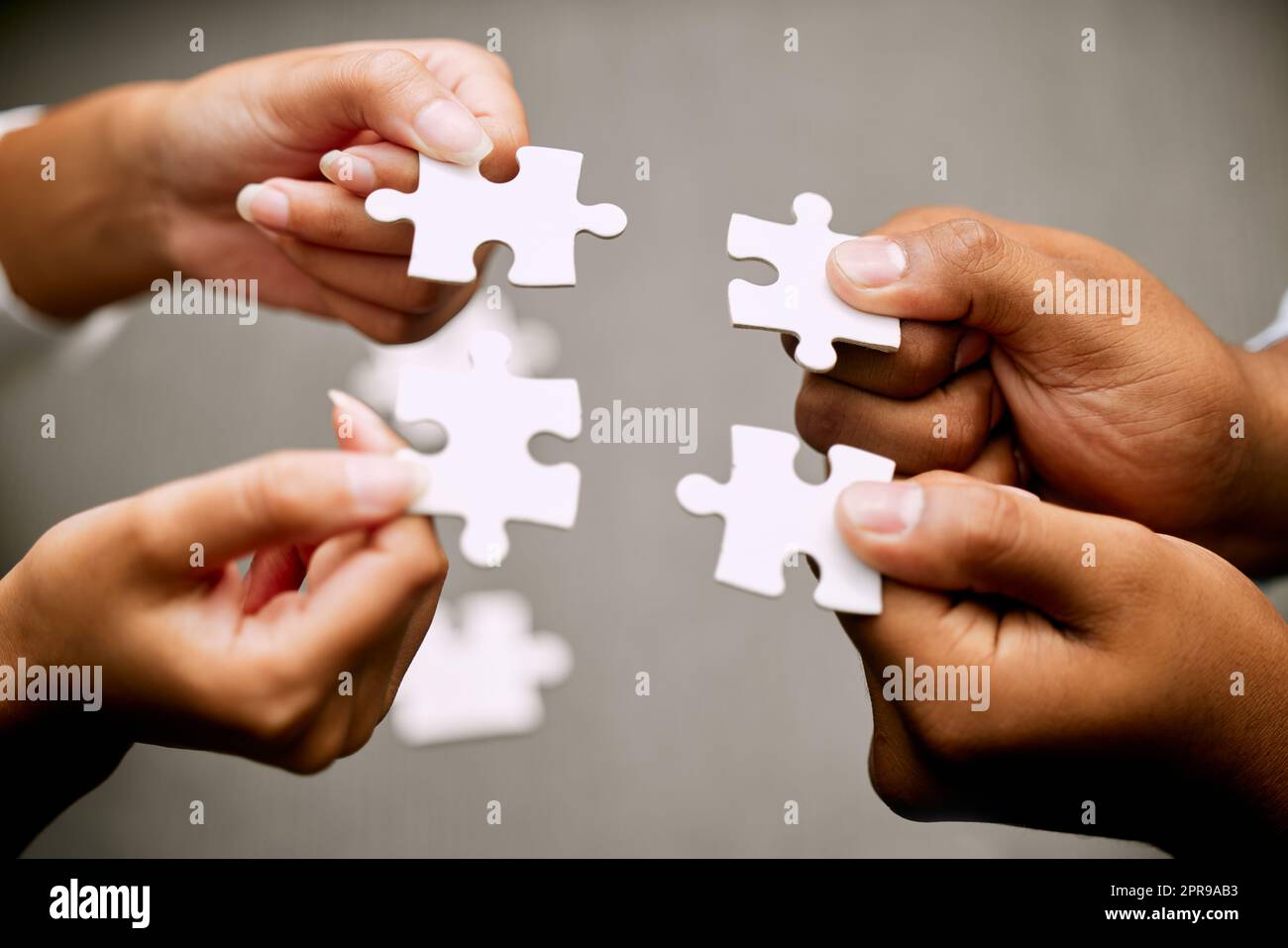 Together we can find the perfect solution. Closeup shot of a group of ...