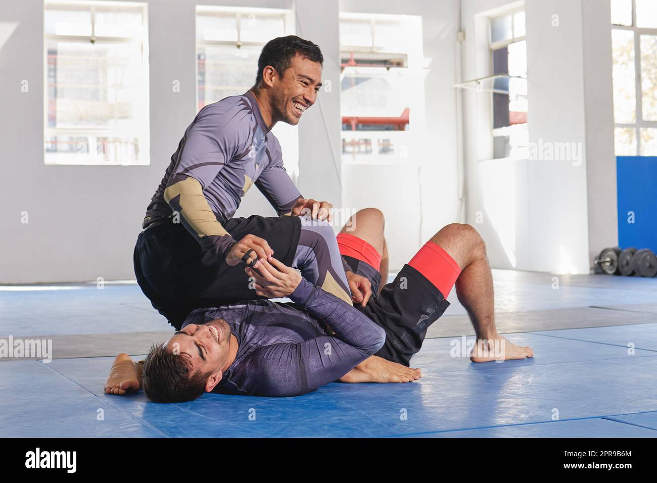 Youve got this. Full length shot of a jiu jitsu sensei sparring with ...