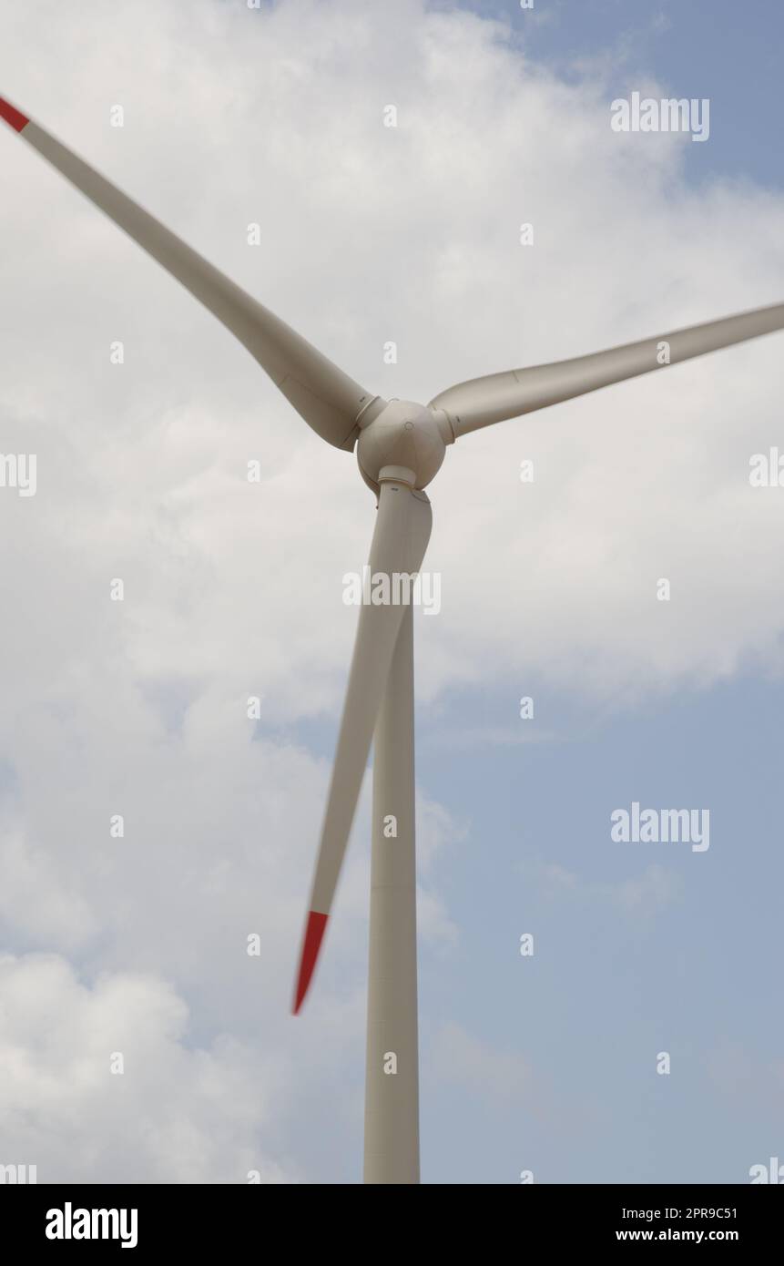 Wind turbine with its blades in motion Stock Photo - Alamy