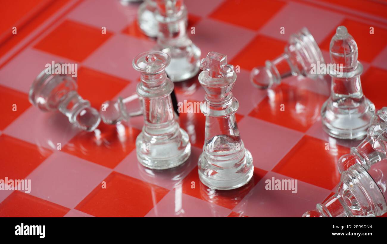 Transparent chess figures, on starting position, on reflective chess ...