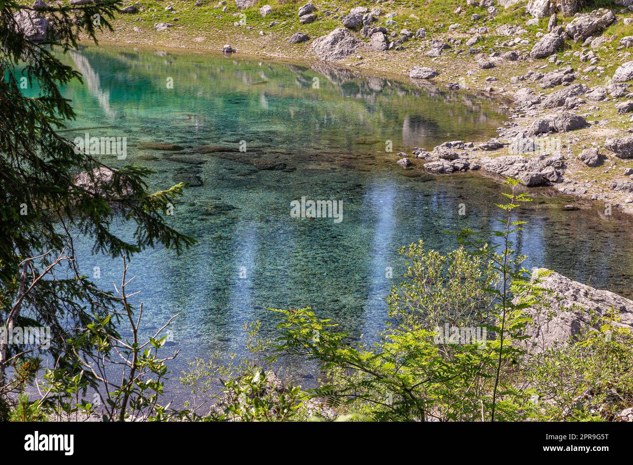 small alpine lake in the Dolomites Stock Photo - Alamy