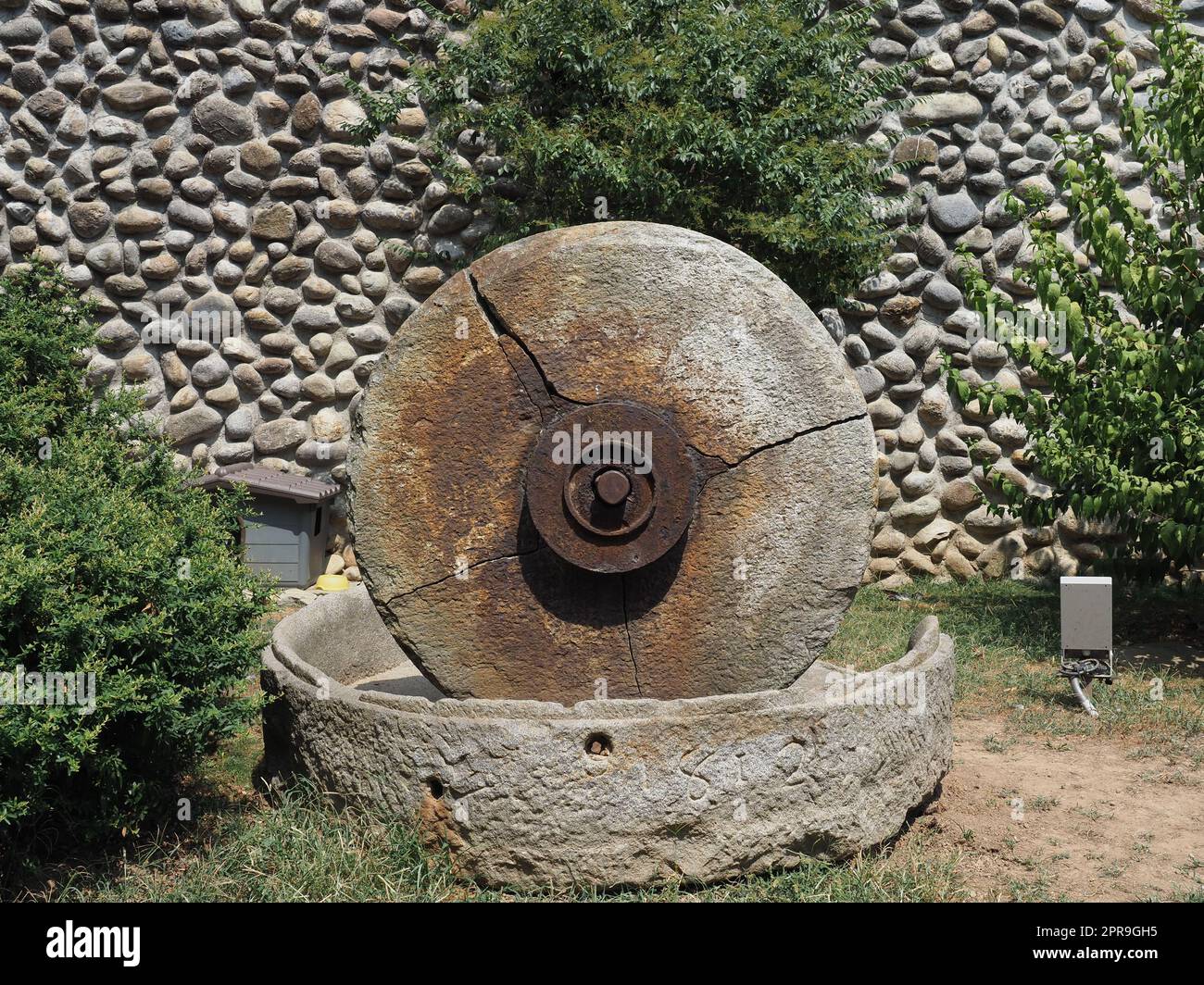 ancient mill millstone Stock Photo - Alamy