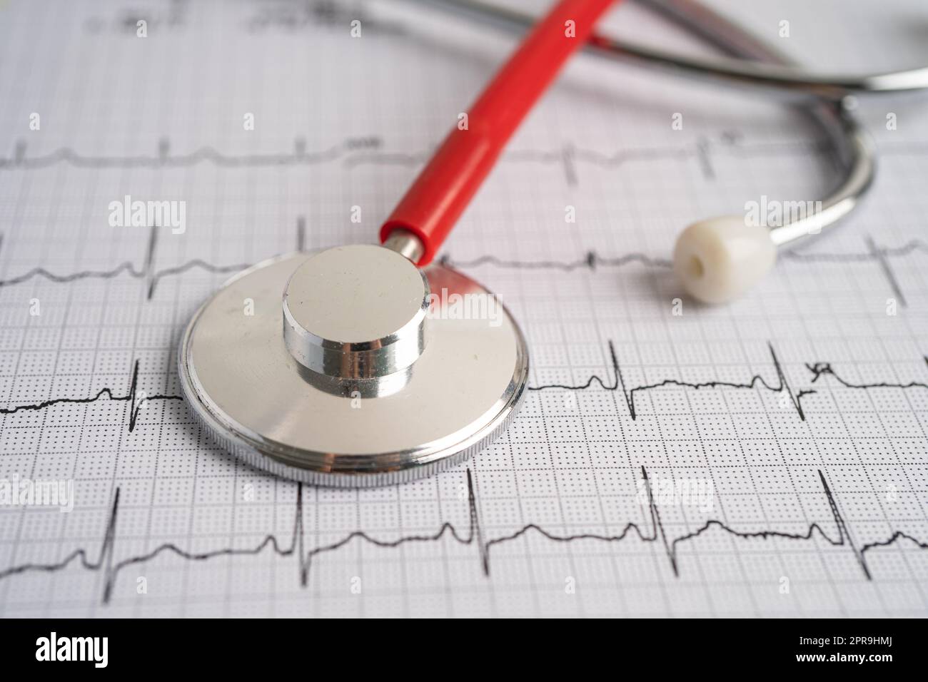 Stethoscope on electrocardiogram (ECG), heart wave, heart attack ...