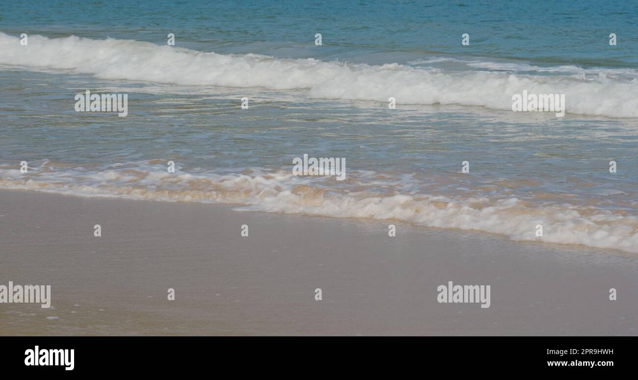 Wave over sand hi-res stock photography and images - Alamy