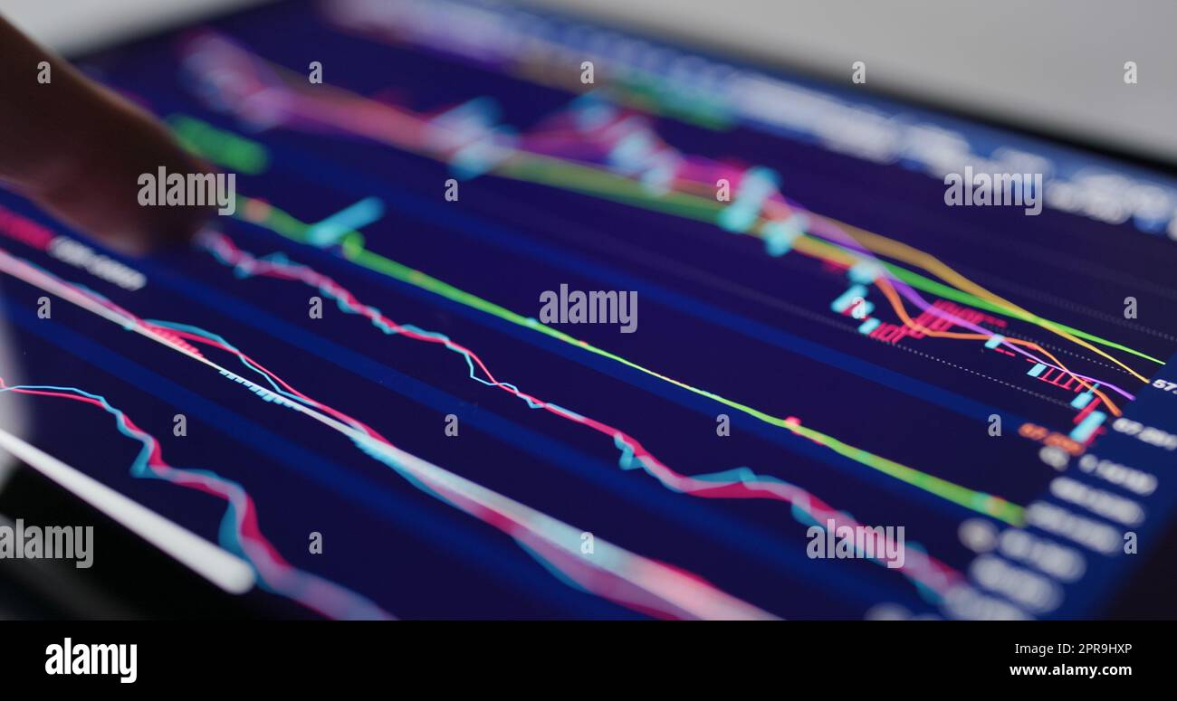 Stock market digital tablet hi-res stock photography and images - Alamy