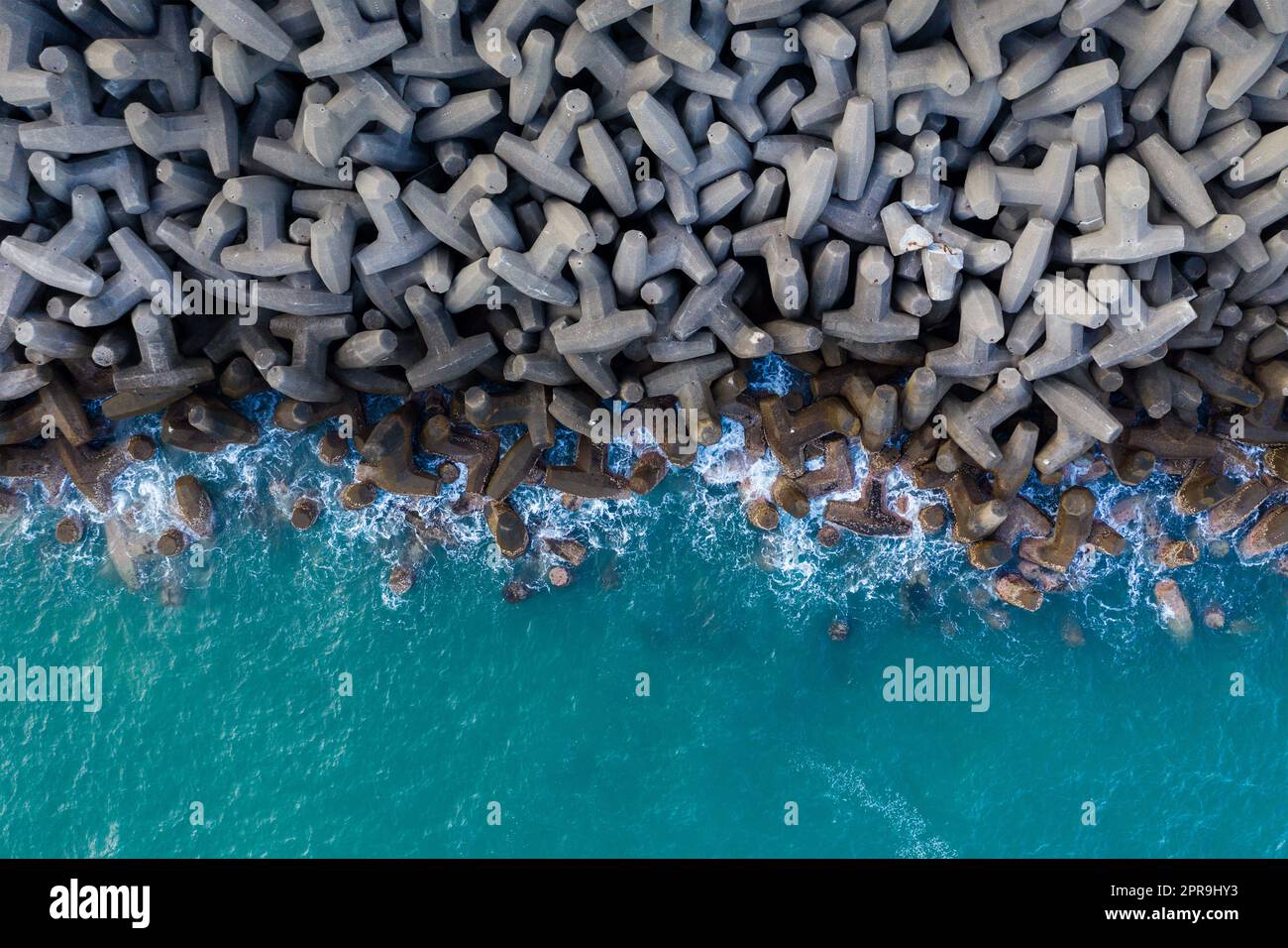 Top down view of the wave breaker over the sea Stock Photo - Alamy