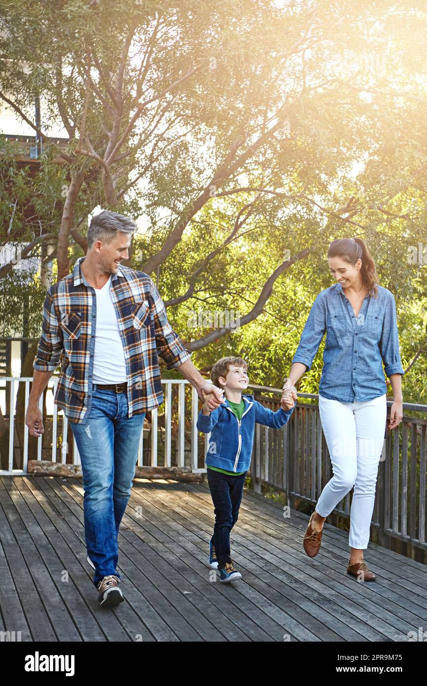 Time spent with family is time well spent. a happy family of three ...