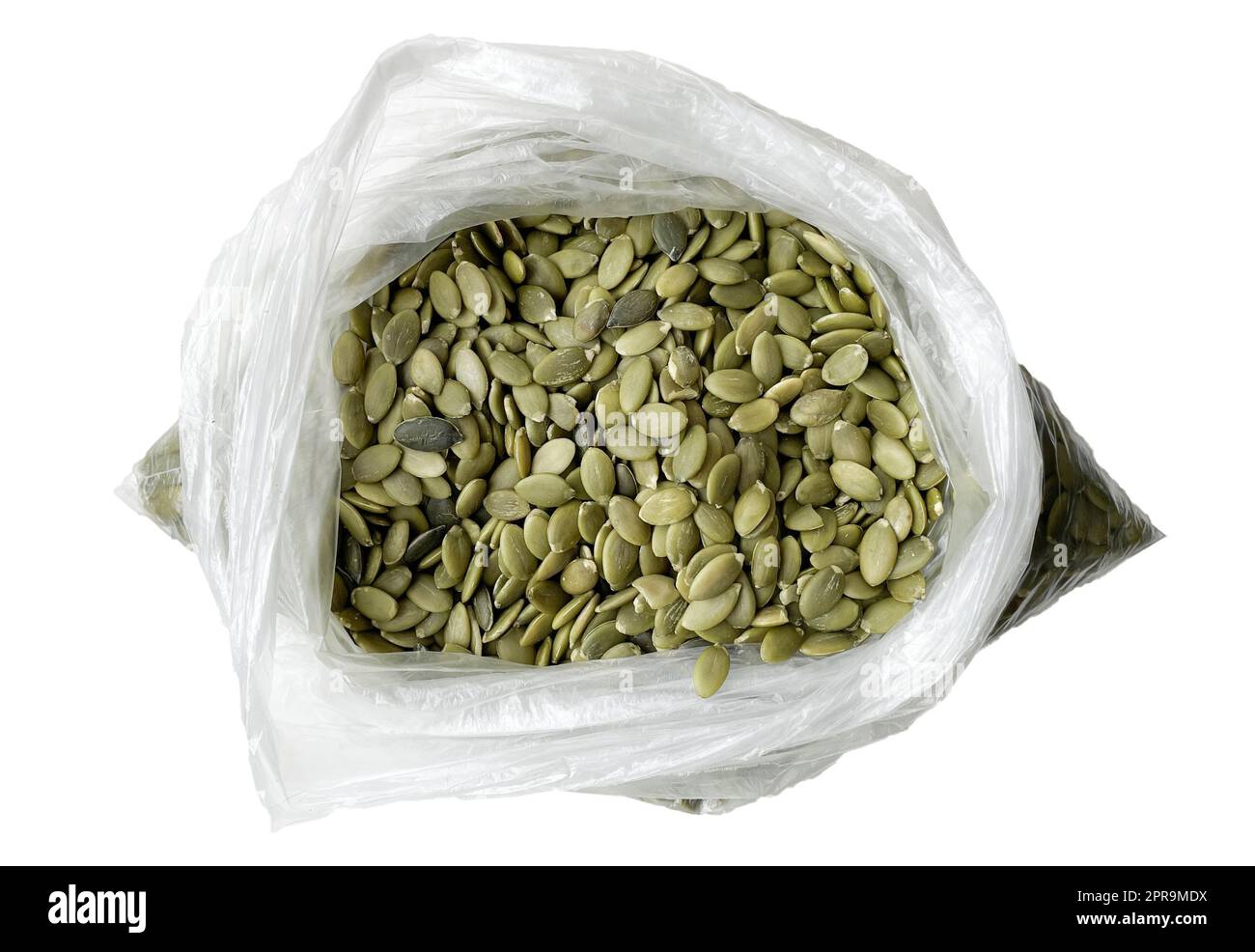 pumpkin seeds in a bag on a white background Stock Photo - Alamy