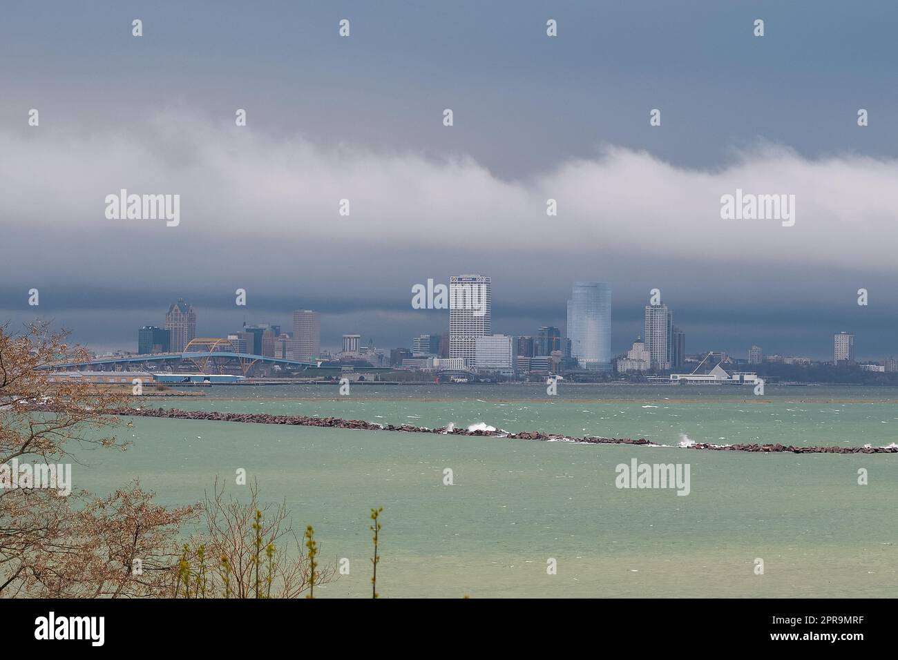 Milwaukee skyline with storm clouds viewed over Lake Michigan in ...
