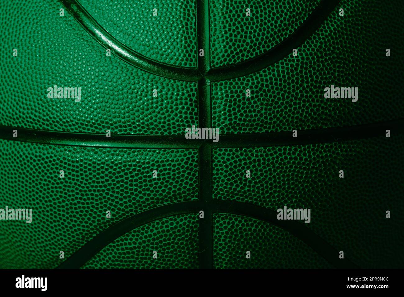 Closeup detail of green basketball ball texture background. Horizontal ...