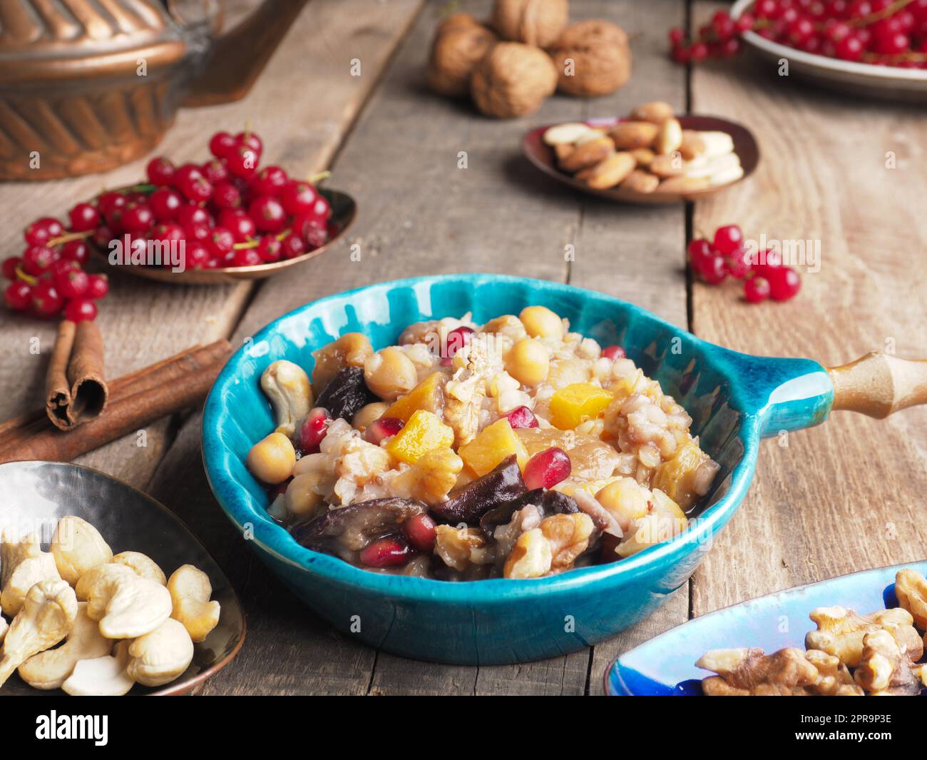 Tasty Noah s ark pudding in a creamic bowl on a rustic wooden table ...