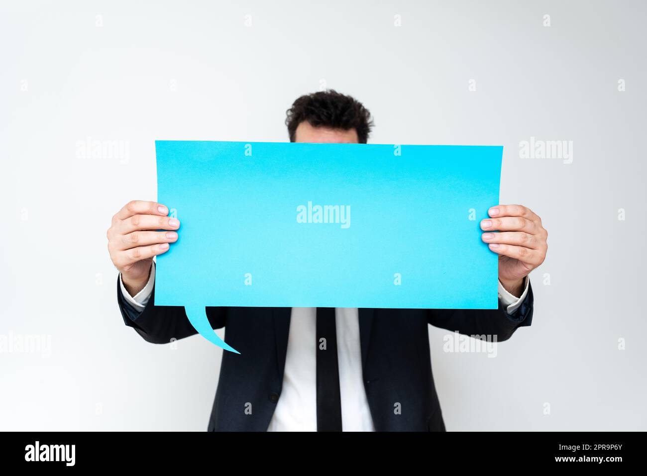 Businessman Holding Speech Bubble With Important Messages. Man In Suit ...