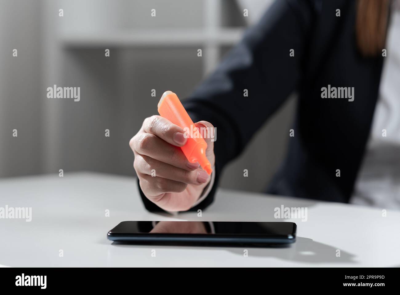 Businesswoman Pointing With Marker On Important Messages On Desk With ...