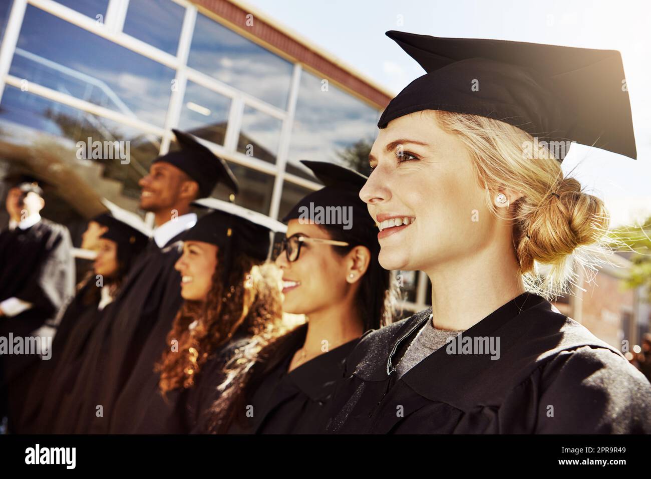The proudest day of their lives. students standing outside on ...