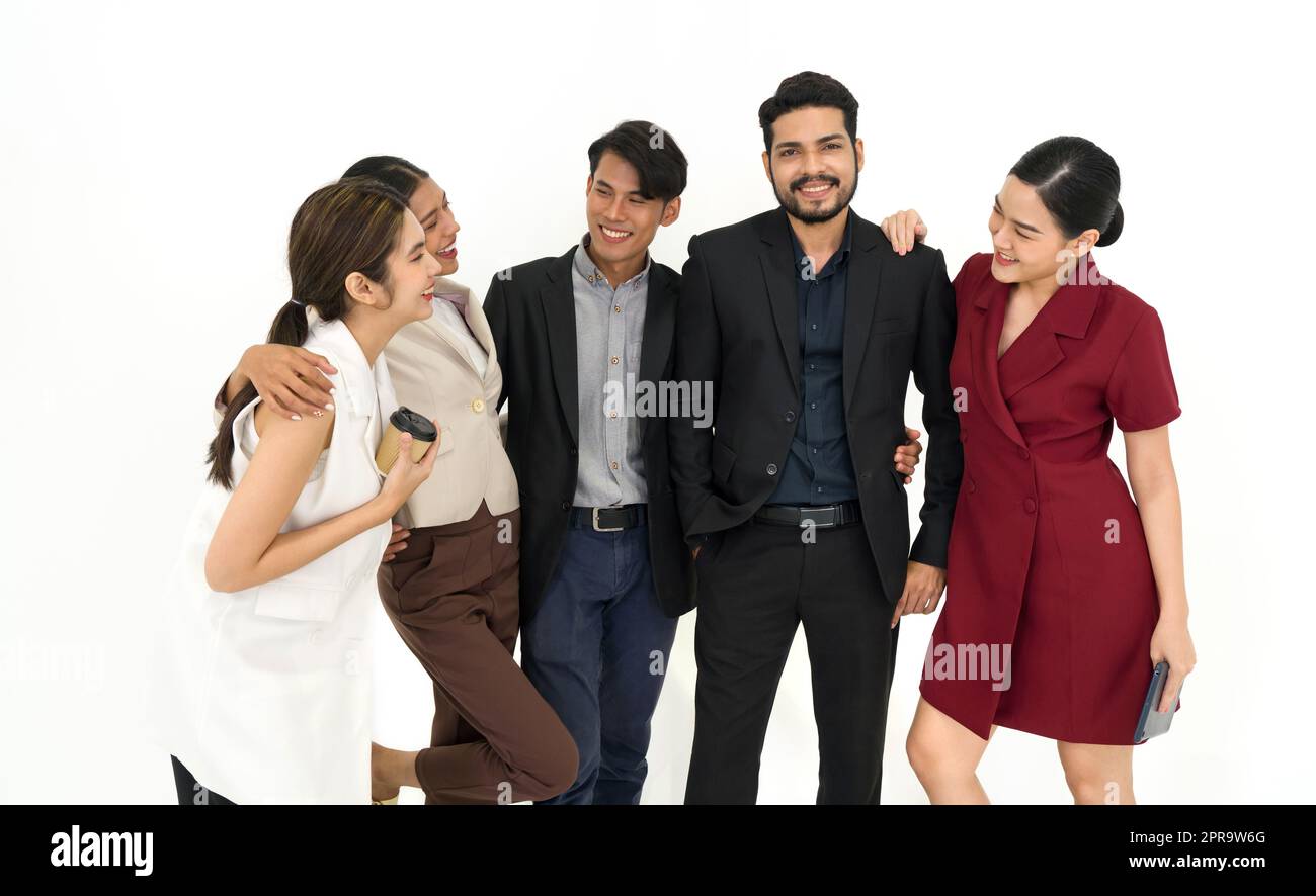 Team of successful young people standing together. Some people drink ...