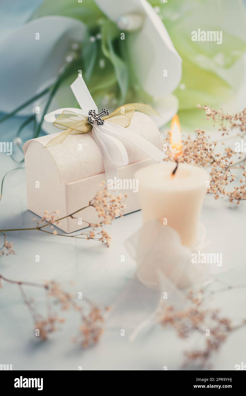 First holy communion or confirmation - candle with flowers and small ...