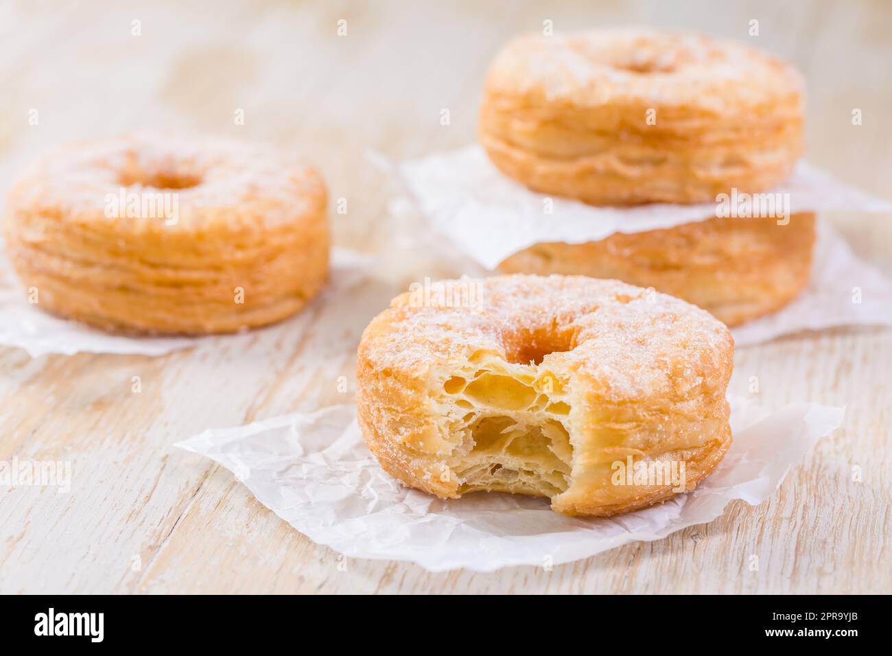 Cronuts - delicious fusion of croissant and donut Stock Photo - Alamy