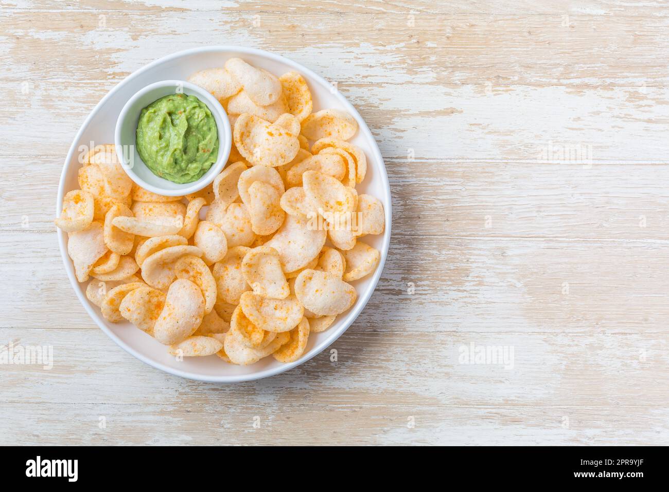 Fried shrimp cracker in thai style. Shrimp cracker with avocado dip ...