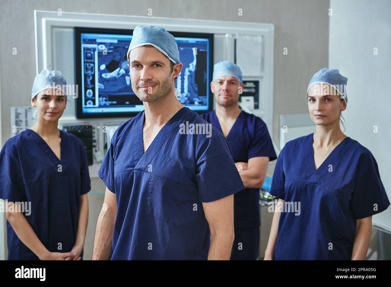 Its always a good day to save lives. Portrait of a team of surgeons in ...