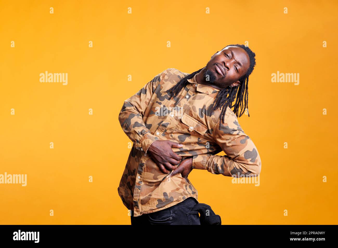 African american person suffering from backache, having lower back pain ...