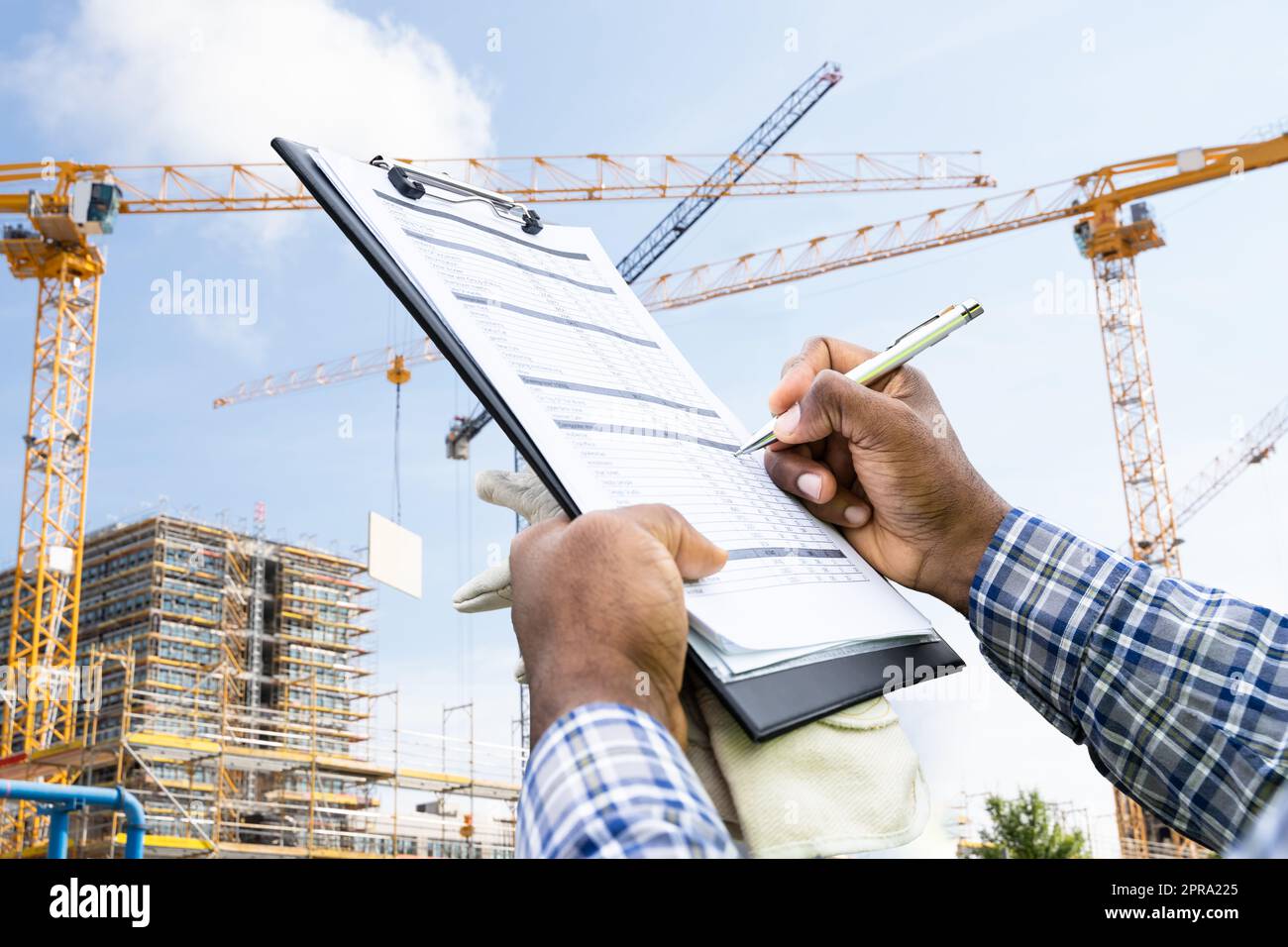 OSHA Inspection Worker At Construction Site Stock Photo - Alamy
