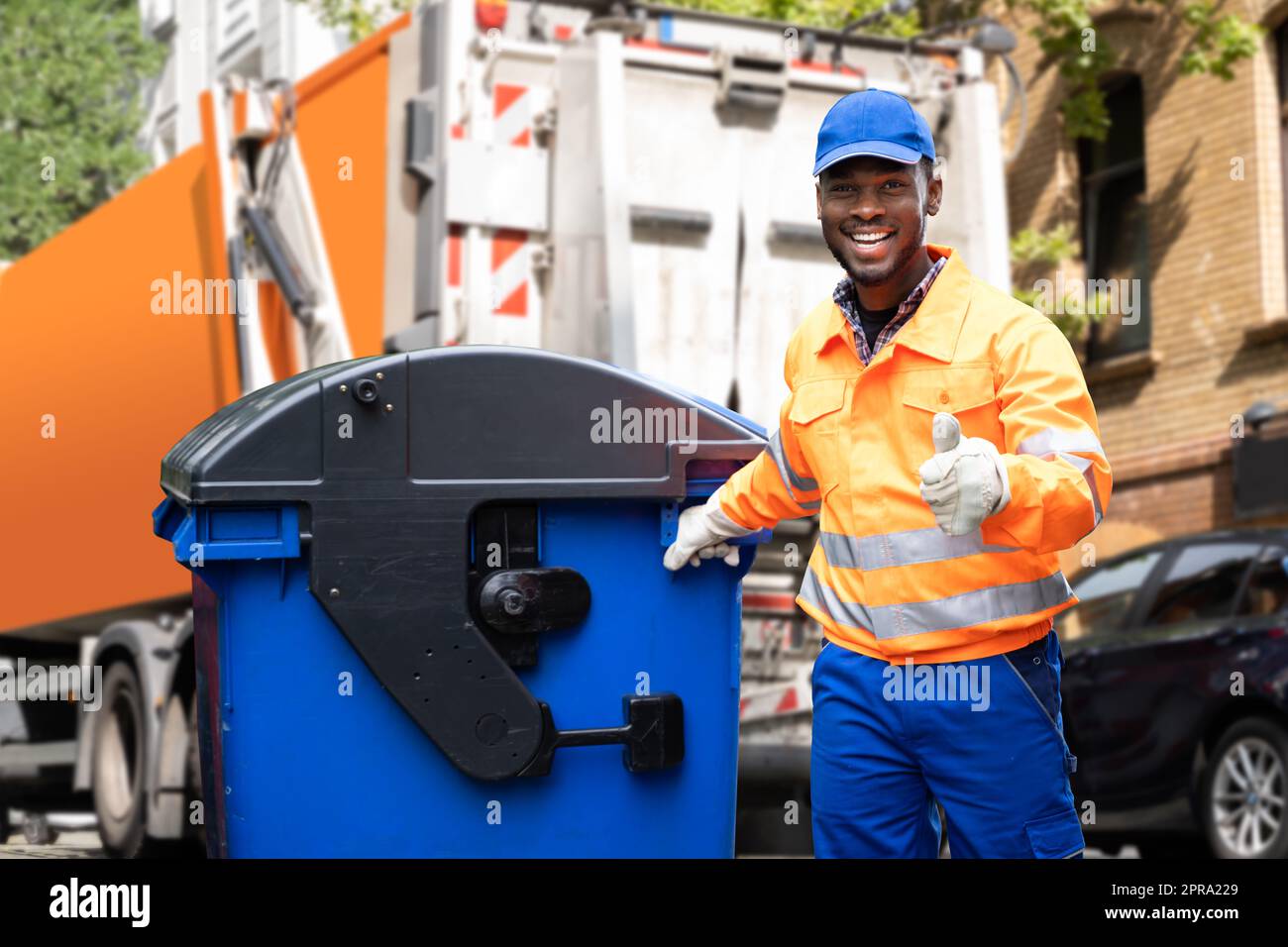 African cleaning garbage hi-res stock photography and images - Alamy