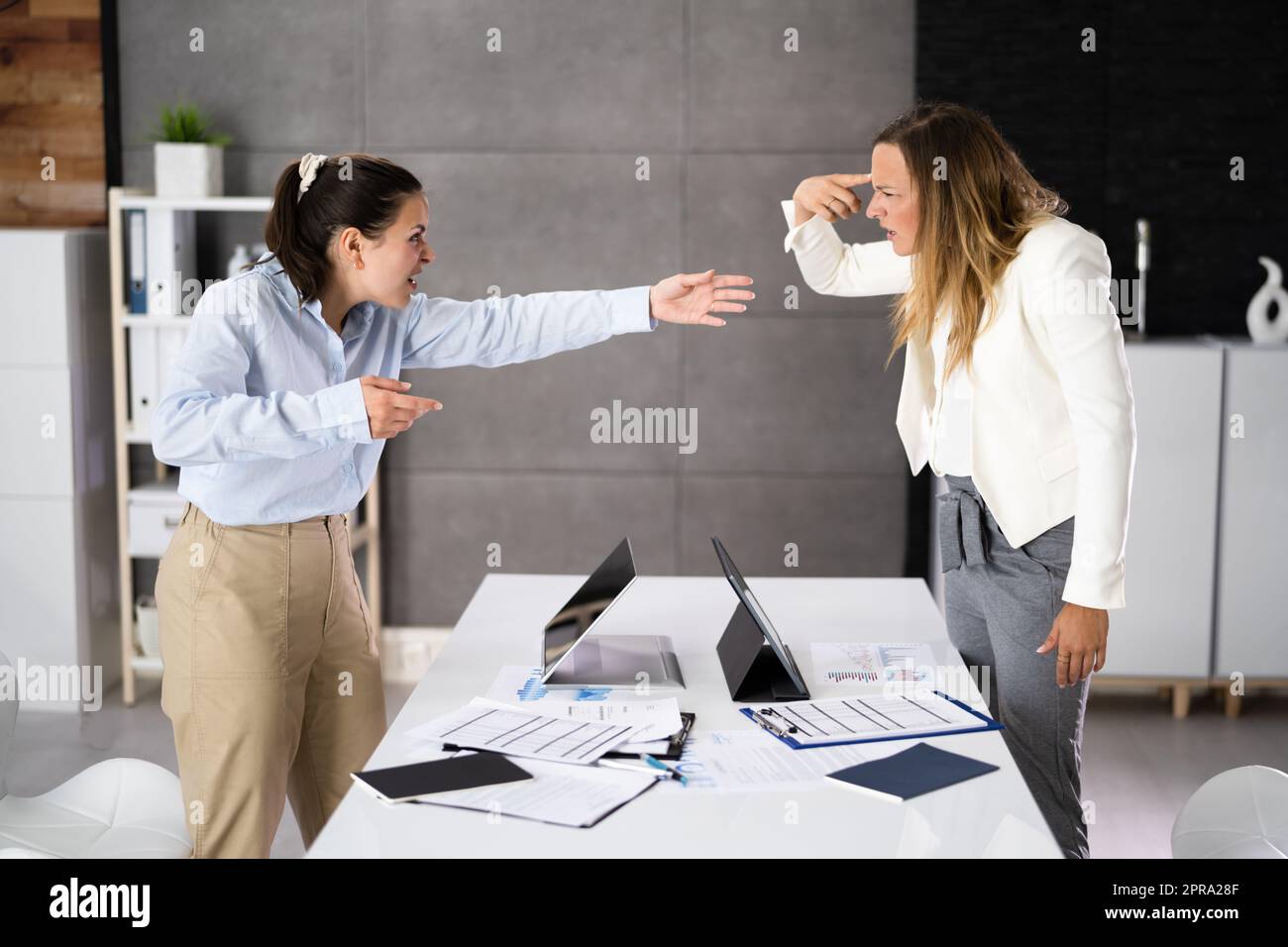 Workplace Conflict. Business Woman Fighting Stock Photo - Alamy