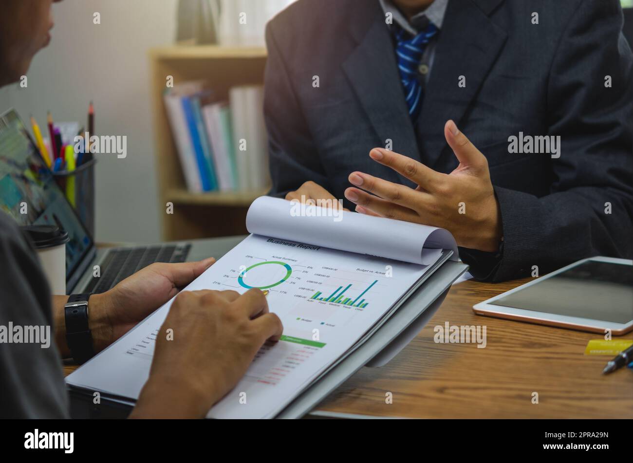 Analyzing data graphs business team hi-res stock photography and images ...