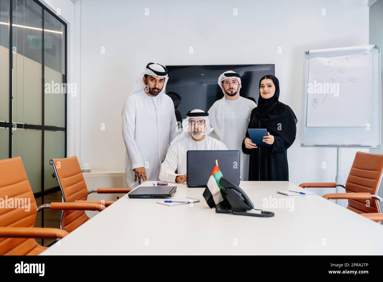 Group of middle-eastern corporate business people wearing traditional ...