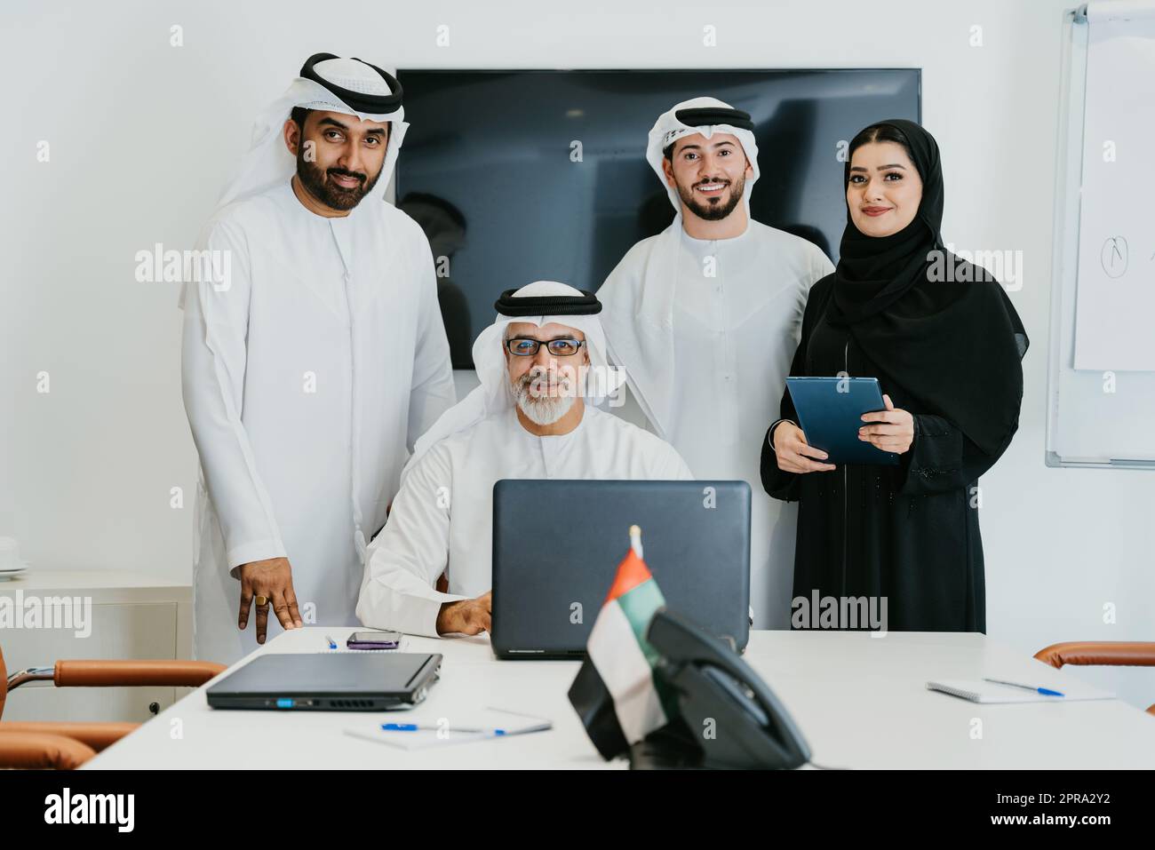 Group of middle-eastern corporate business people wearing traditional ...