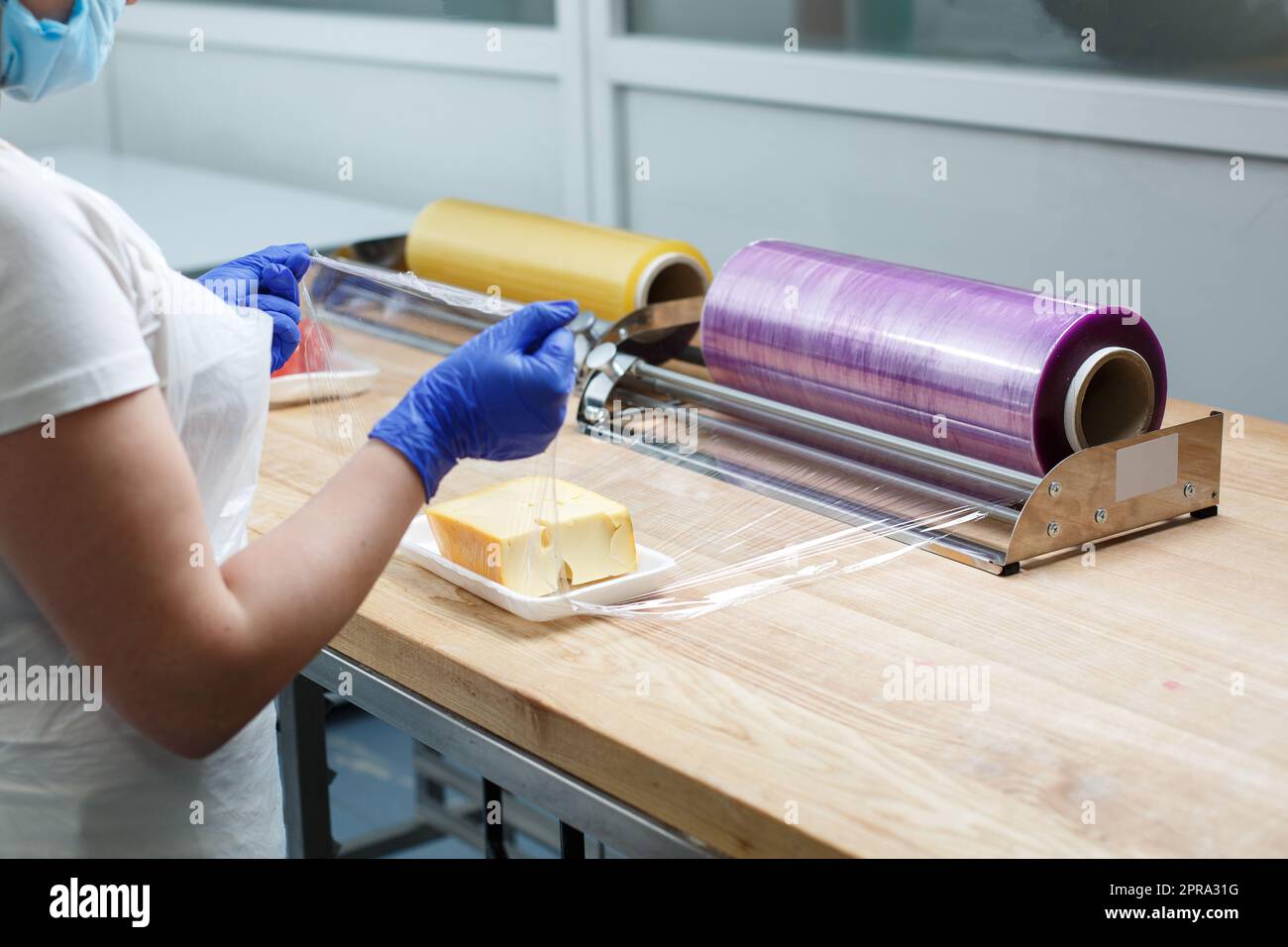 Film wrapped cheese hi-res stock photography and images - Alamy