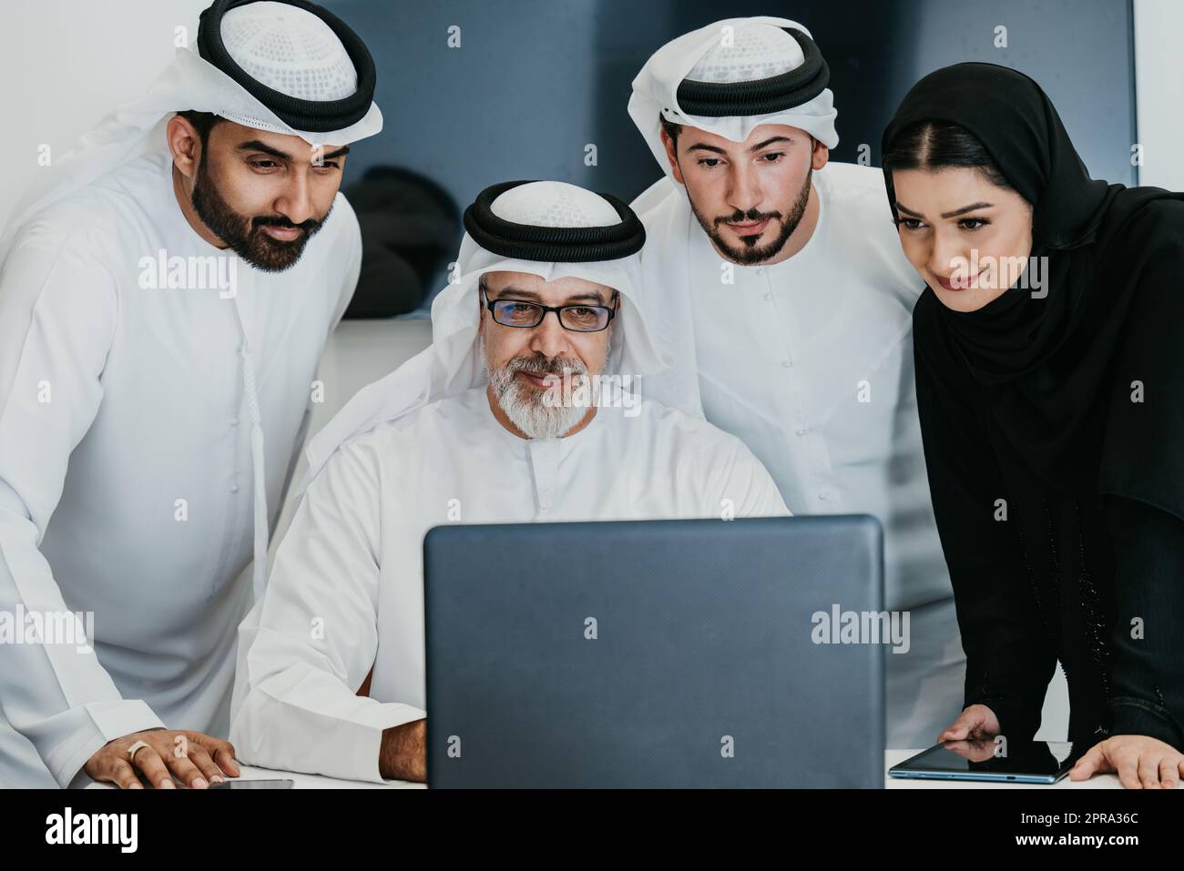 Group of middle-eastern corporate business people wearing traditional ...