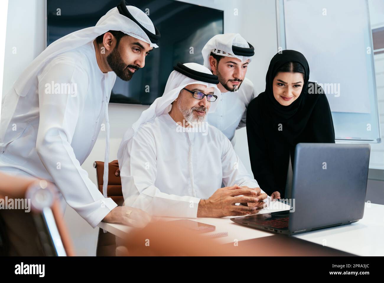 Group of middle-eastern corporate business people wearing traditional ...