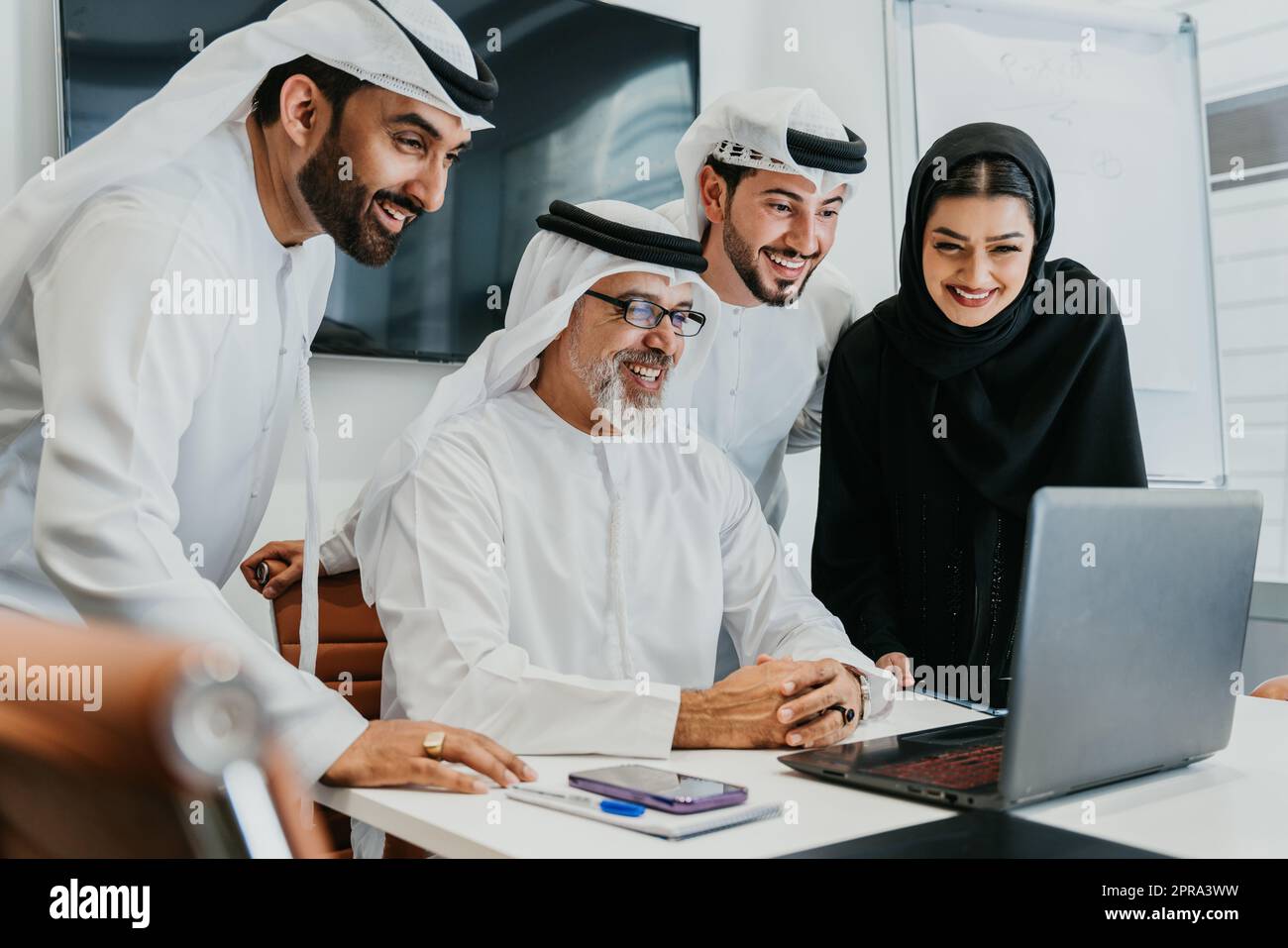 Group of middle-eastern corporate business people wearing traditional ...