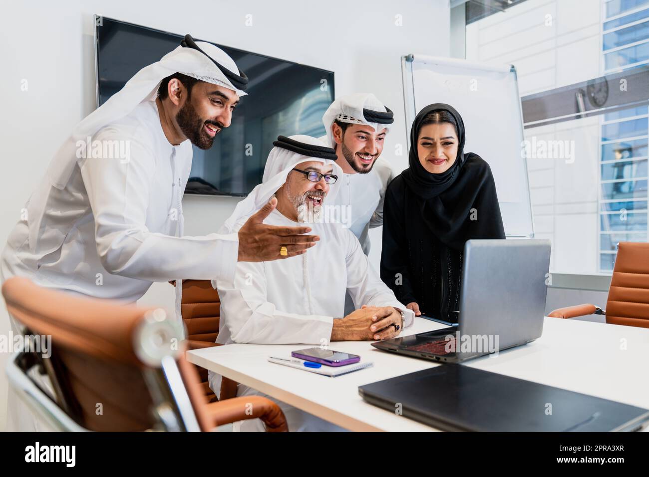 Group of middle-eastern corporate business people wearing traditional ...