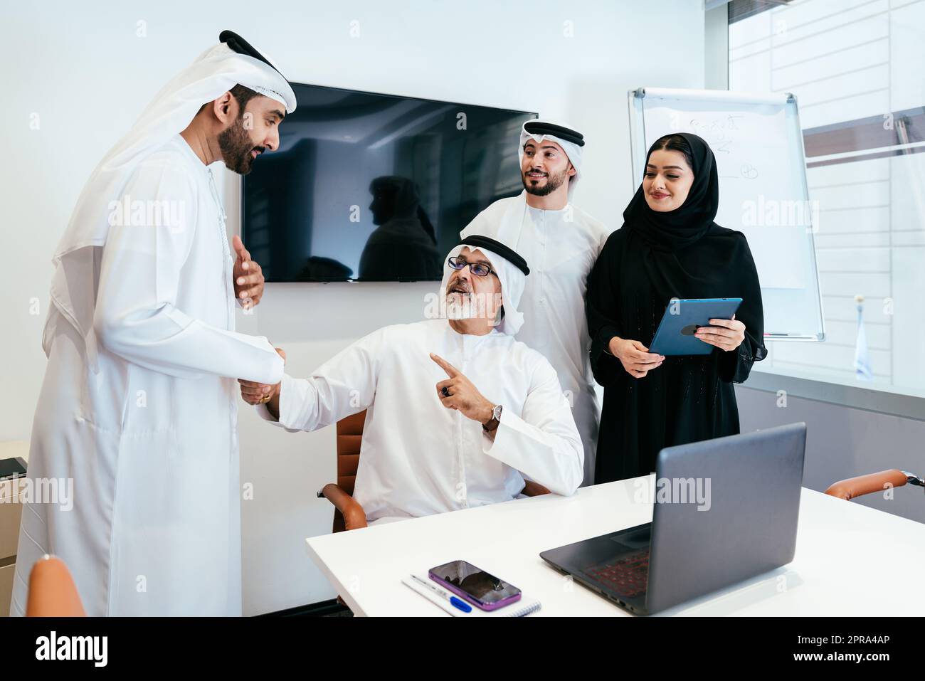 Group of middle-eastern corporate business people wearing traditional ...