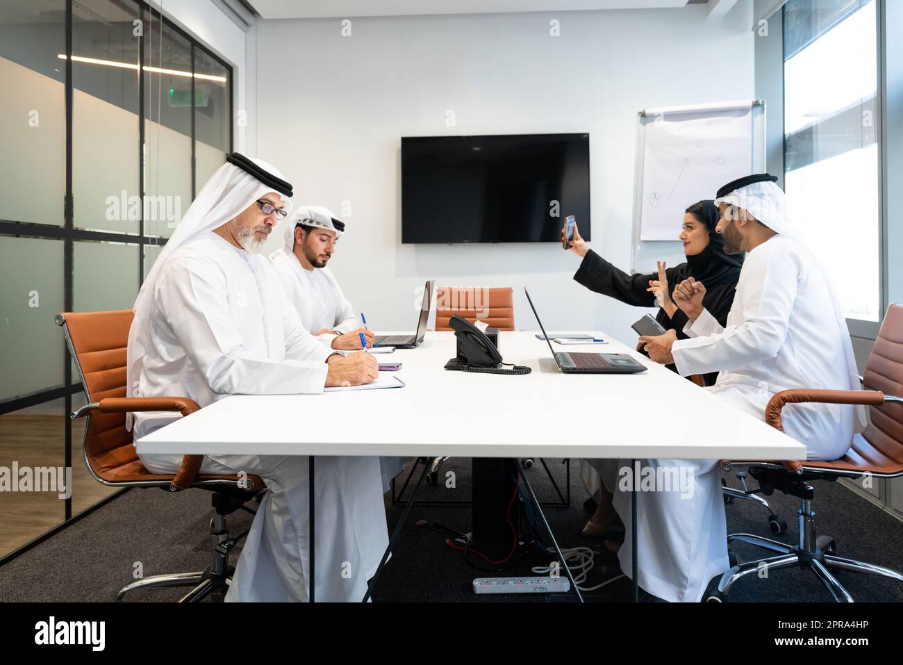 Group of middle-eastern corporate business people wearing traditional ...