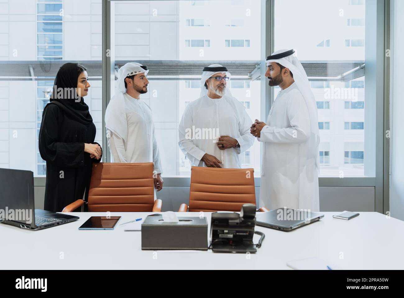 Group of middle-eastern corporate business people wearing traditional ...