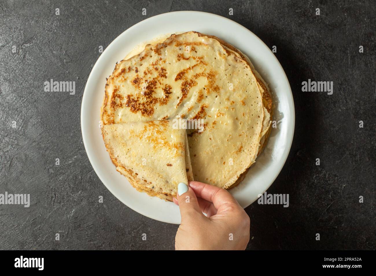 top view baked delicious pancakes inside white plate on the dark ...