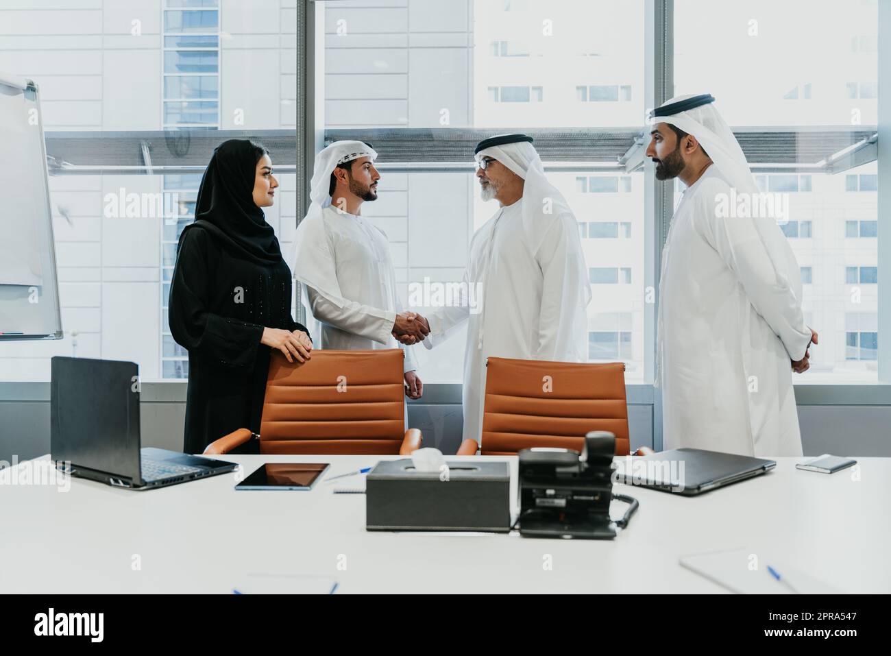 Group of middle-eastern corporate business people wearing traditional ...