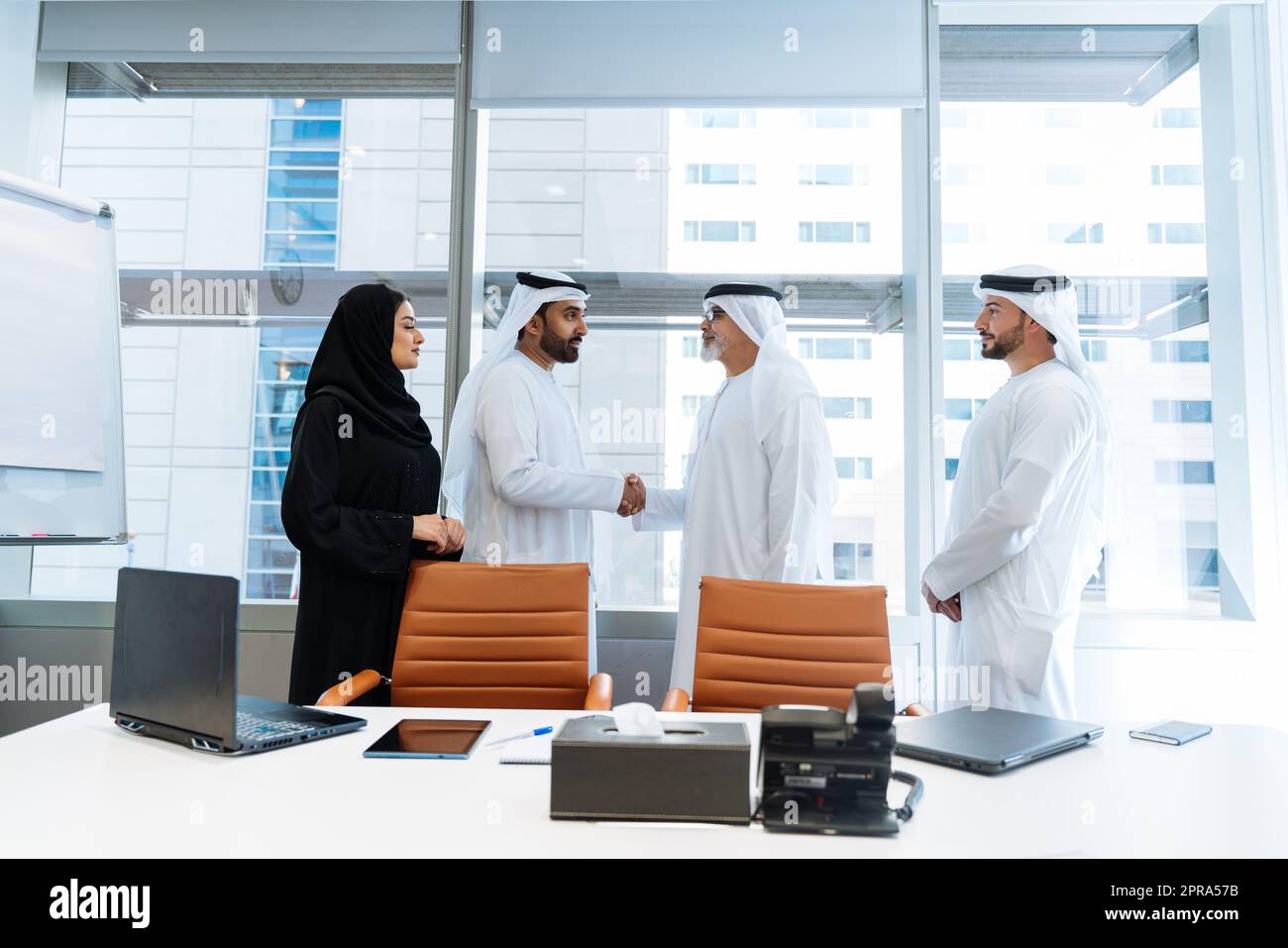 Group of middle-eastern corporate business people wearing traditional ...