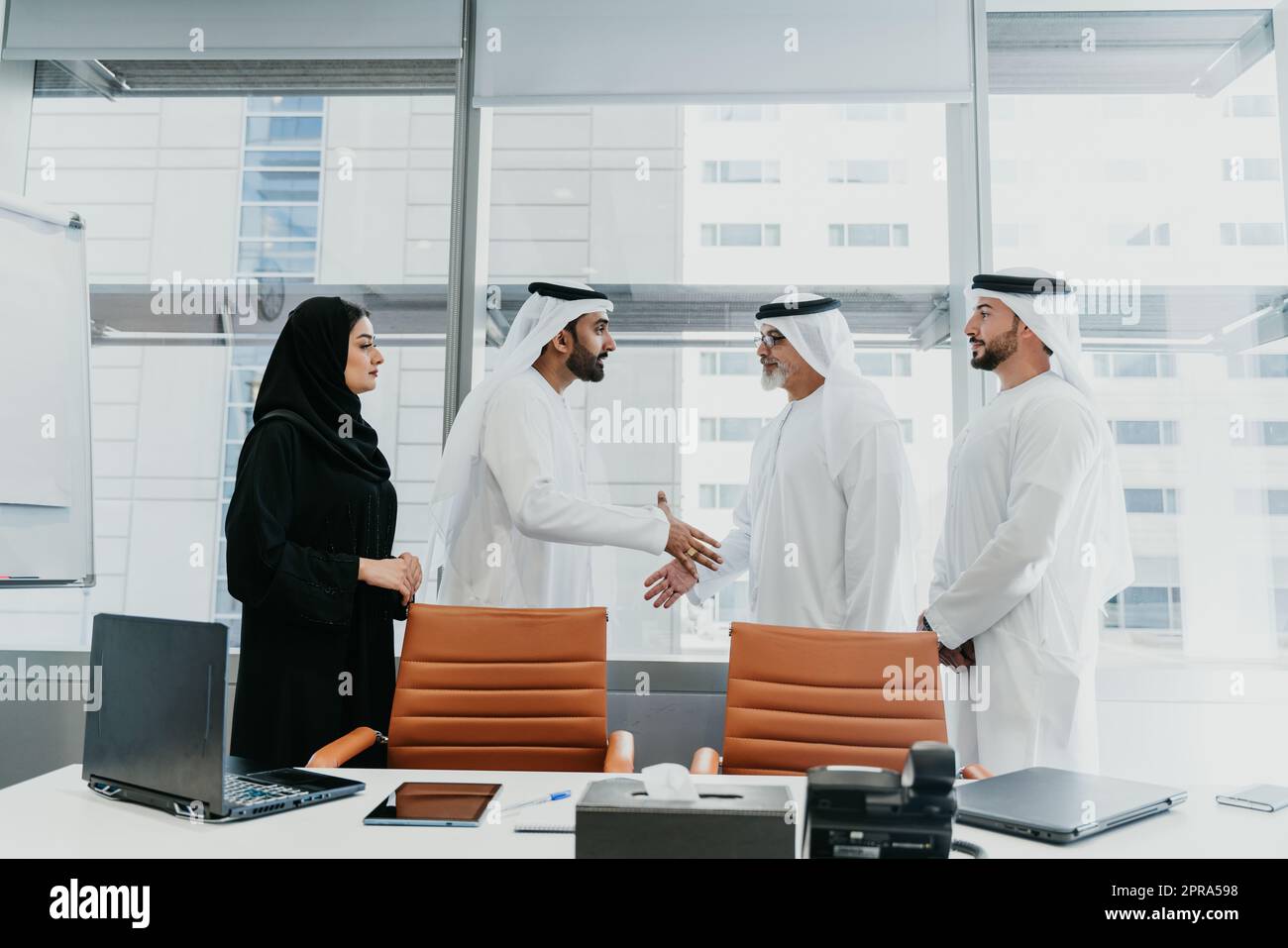 Group of middle-eastern corporate business people wearing traditional ...