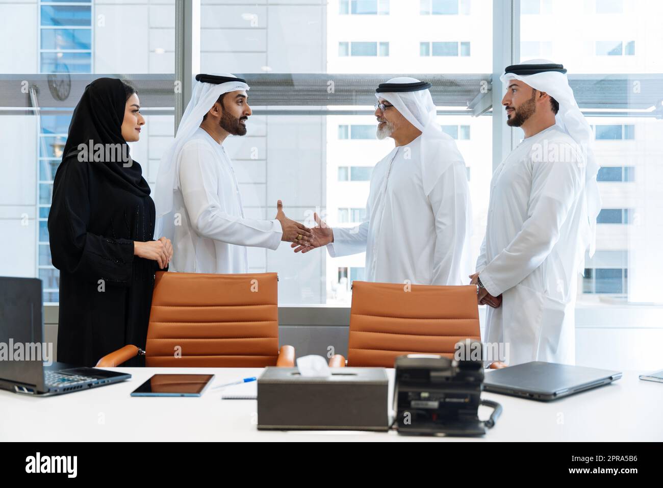 Group of middle-eastern corporate business people wearing traditional ...